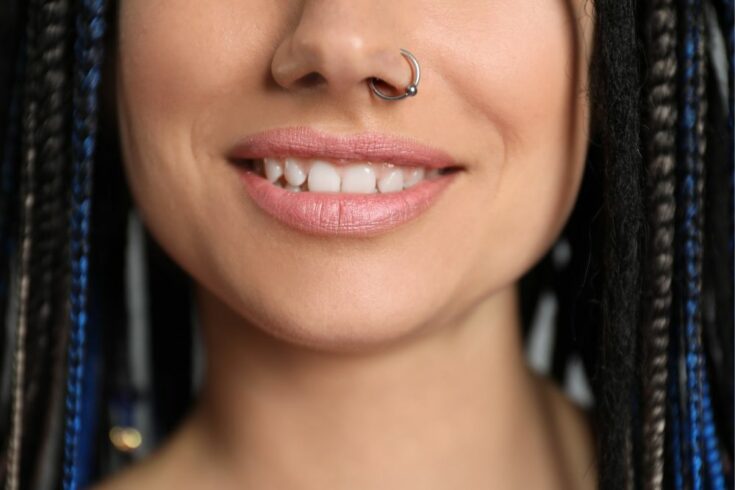 Why Does My Nose Piercing Smell: Causes, Treatment & More